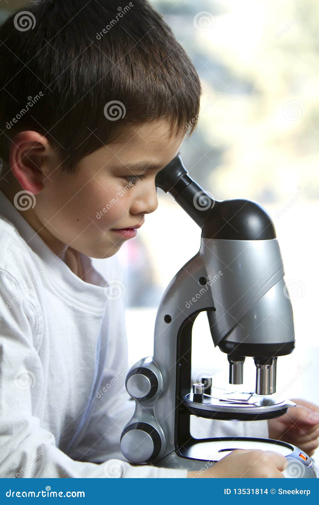 Cute Young Boy Looks into His Microscope Stock Photo - Image of ...