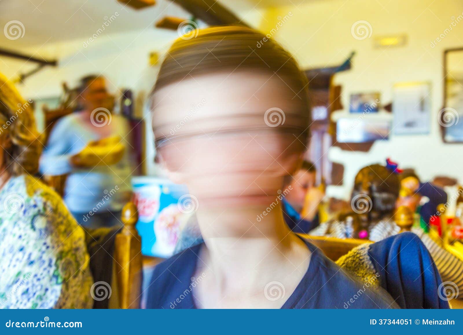 Cute Young Boy in a Restaurant Shaking Head Stock Image - Image of ...