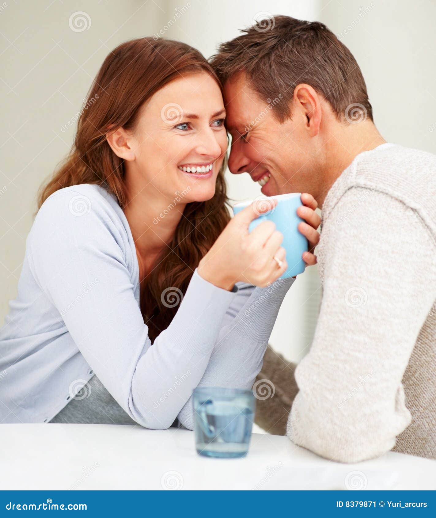 Cute Young Couple Laughing while Drinking Coffee Stock Image - Image of ...