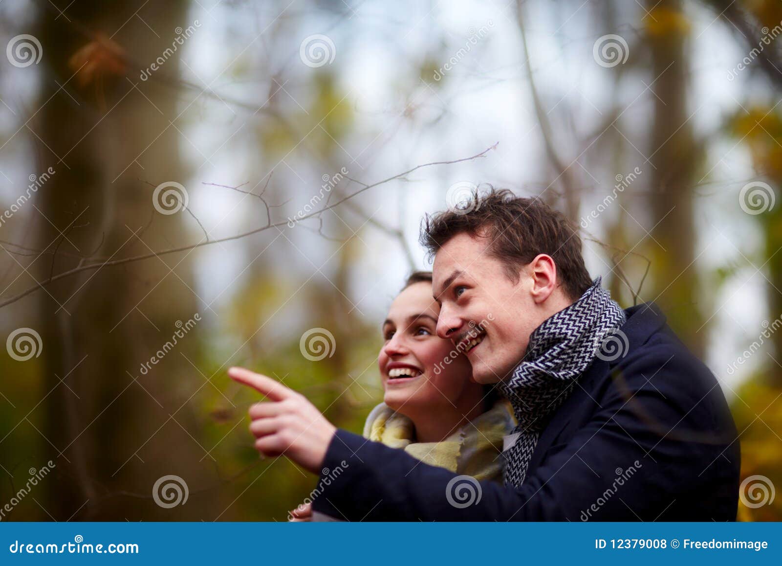 Cute Young Couple Looking and Pointing Stock Photo - Image of modern ...
