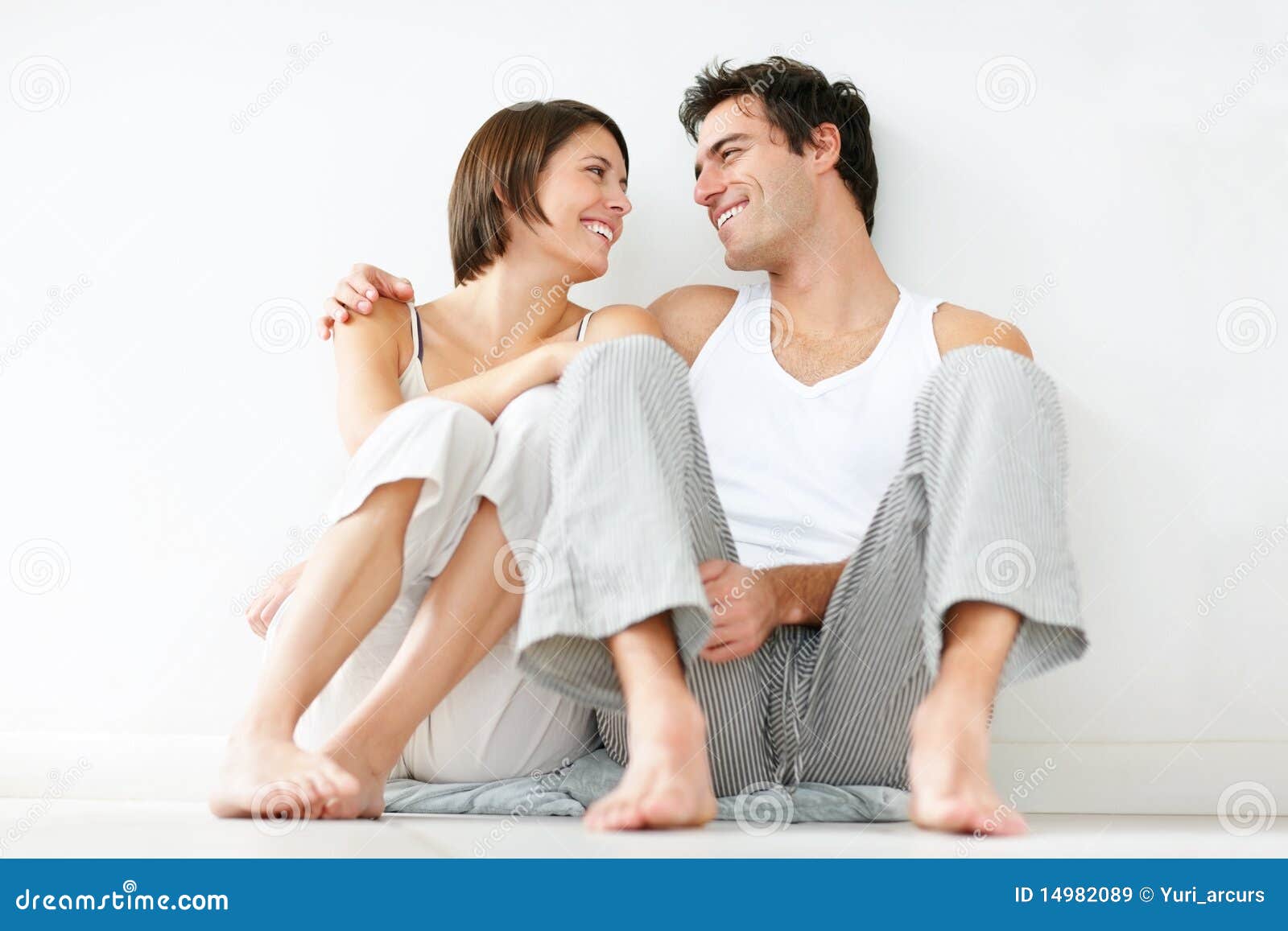 Cute Young Couple Sitting Together on the Floor Stock Image - Image of ...