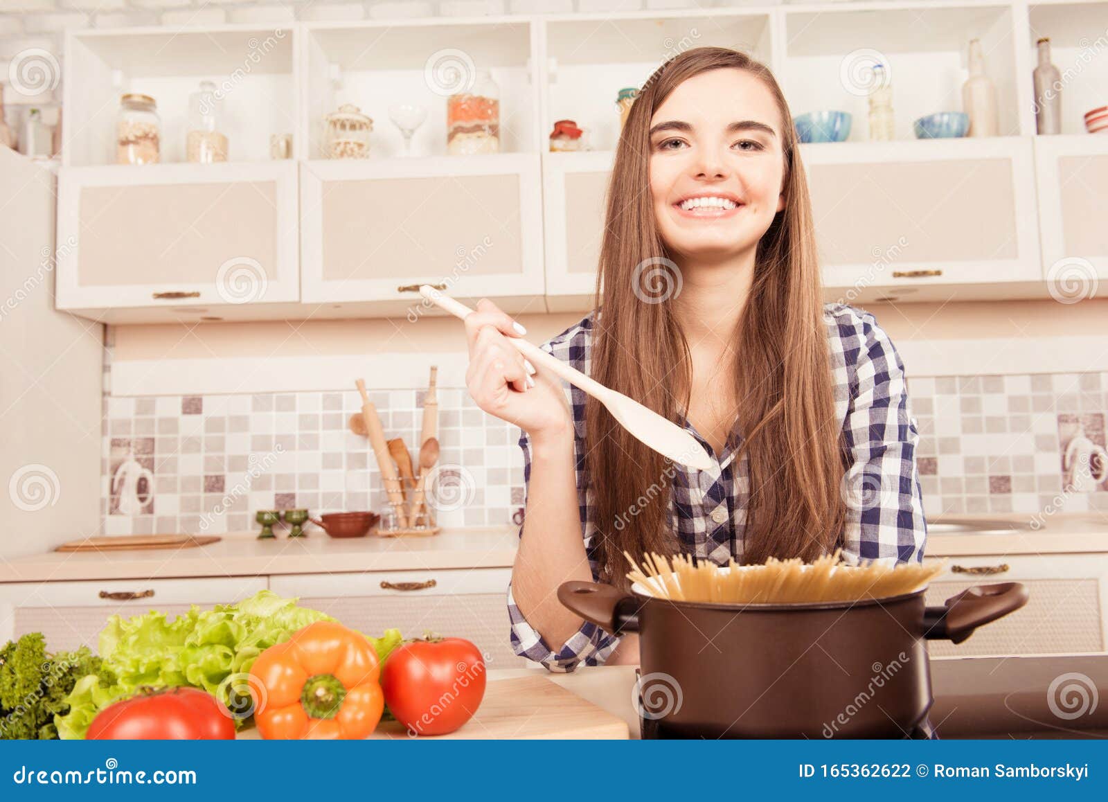 Cute Young Girl Cooking Spaghetti in the Kitchen Stock Photo - Image of ...