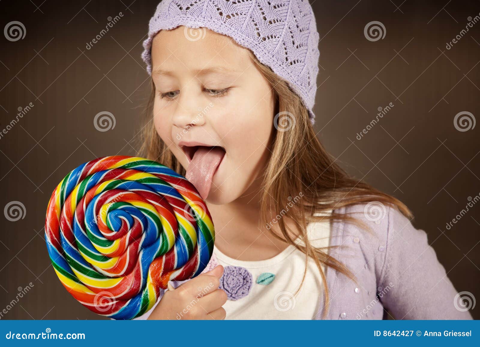 Cute Young Girl With Lollipop Picture. Image: 8642427