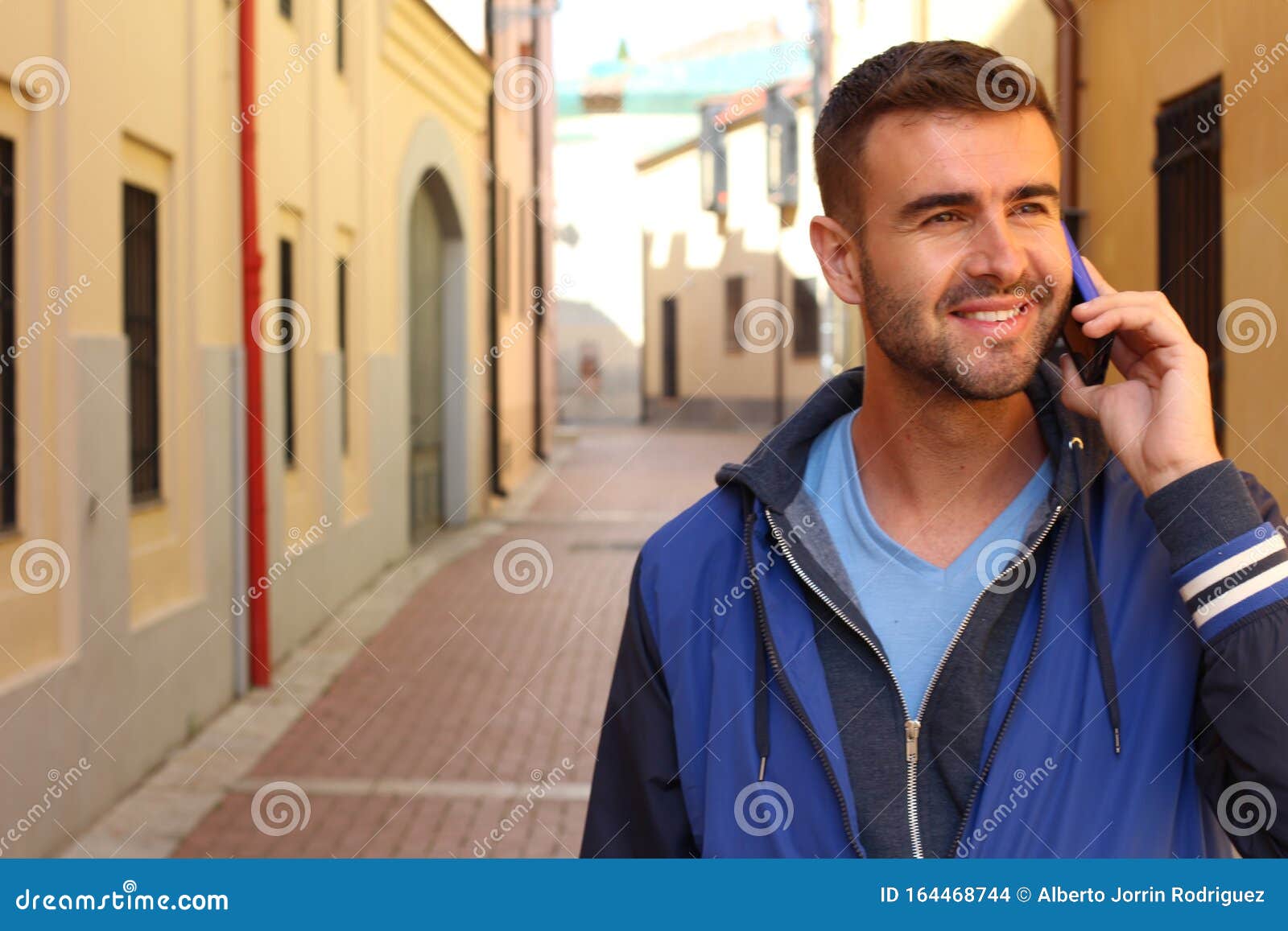 Cute Young Man Calling by Phone Stock Photo - Image of cellphone, male ...
