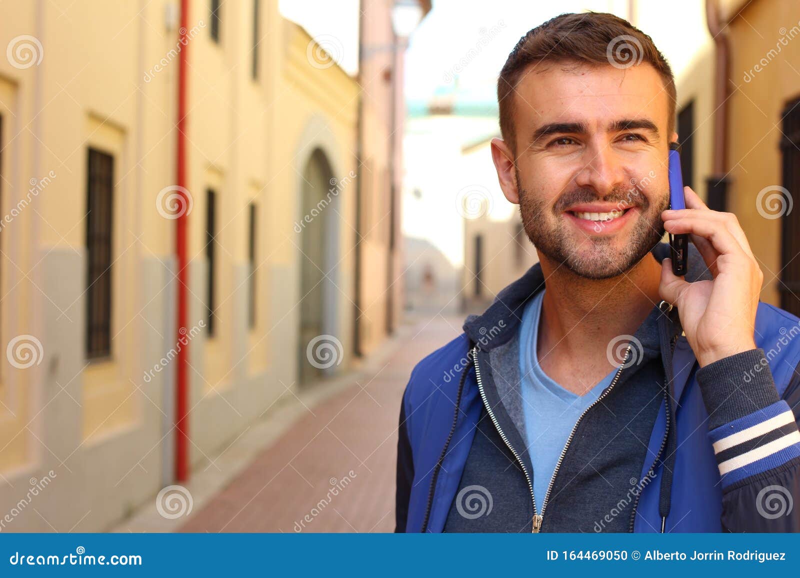 Cute Young Man Calling by Phone Stock Photo - Image of communication ...