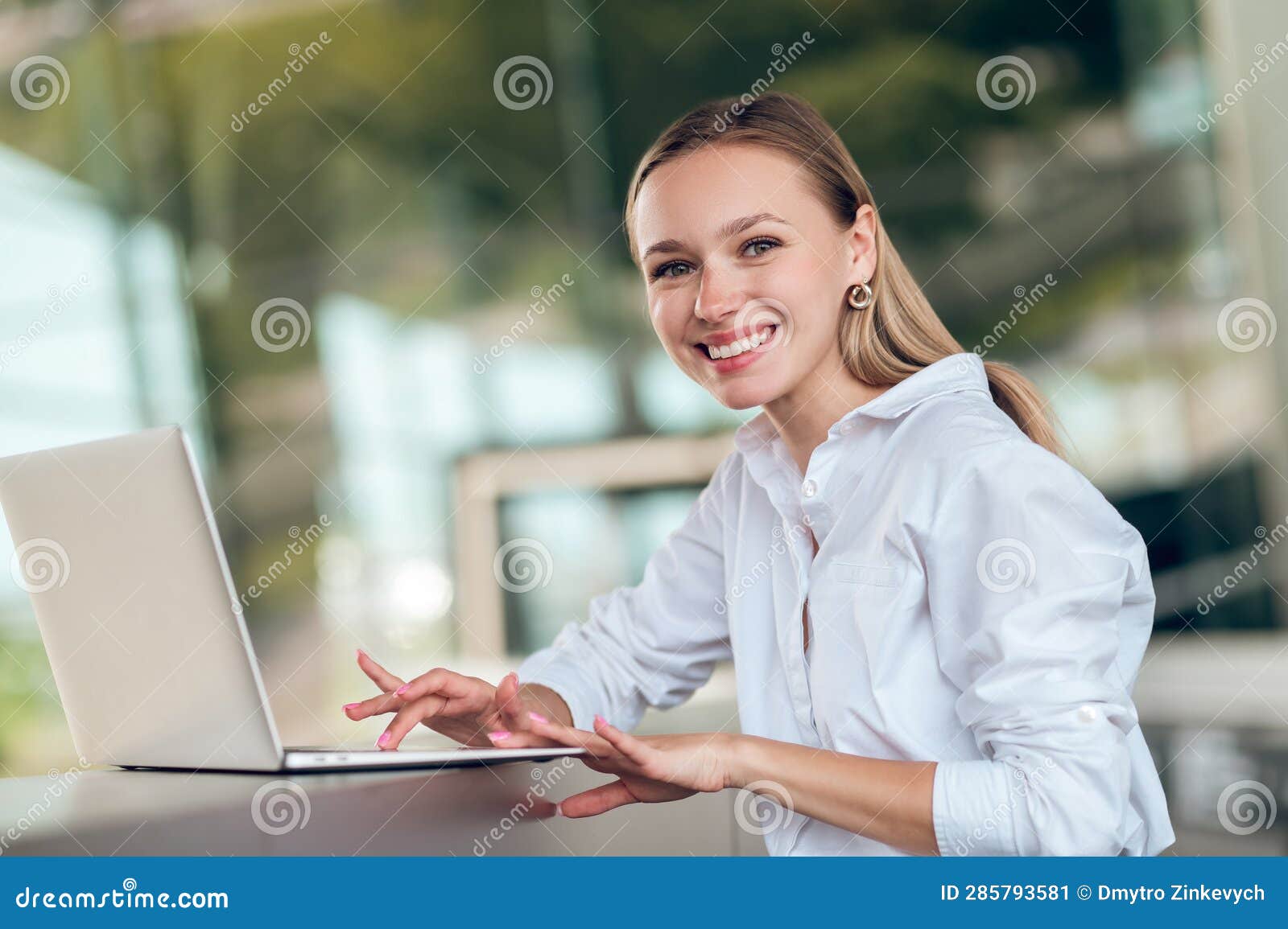 Cute Young Manager Working on a Laptop Stock Image - Image of ...
