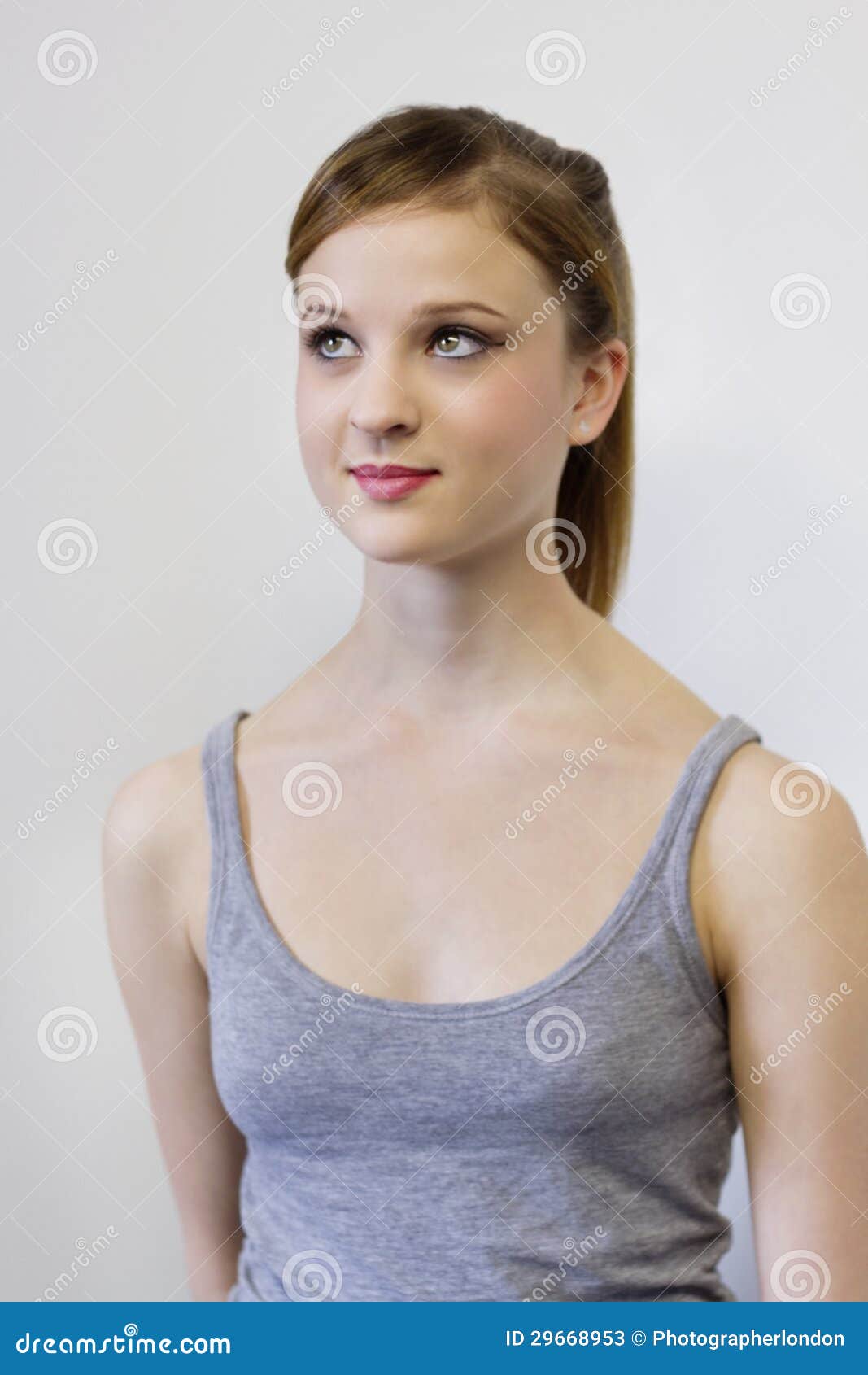 Cute Young Woman Looking Up Stock Image - Image of 1819, smiling: 29668953