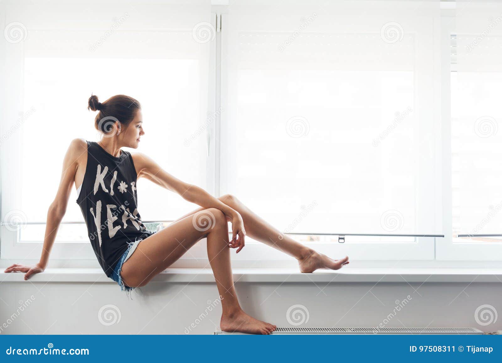 Cute, Young Woman Sitting by the Window Stock Image - Image of window ...