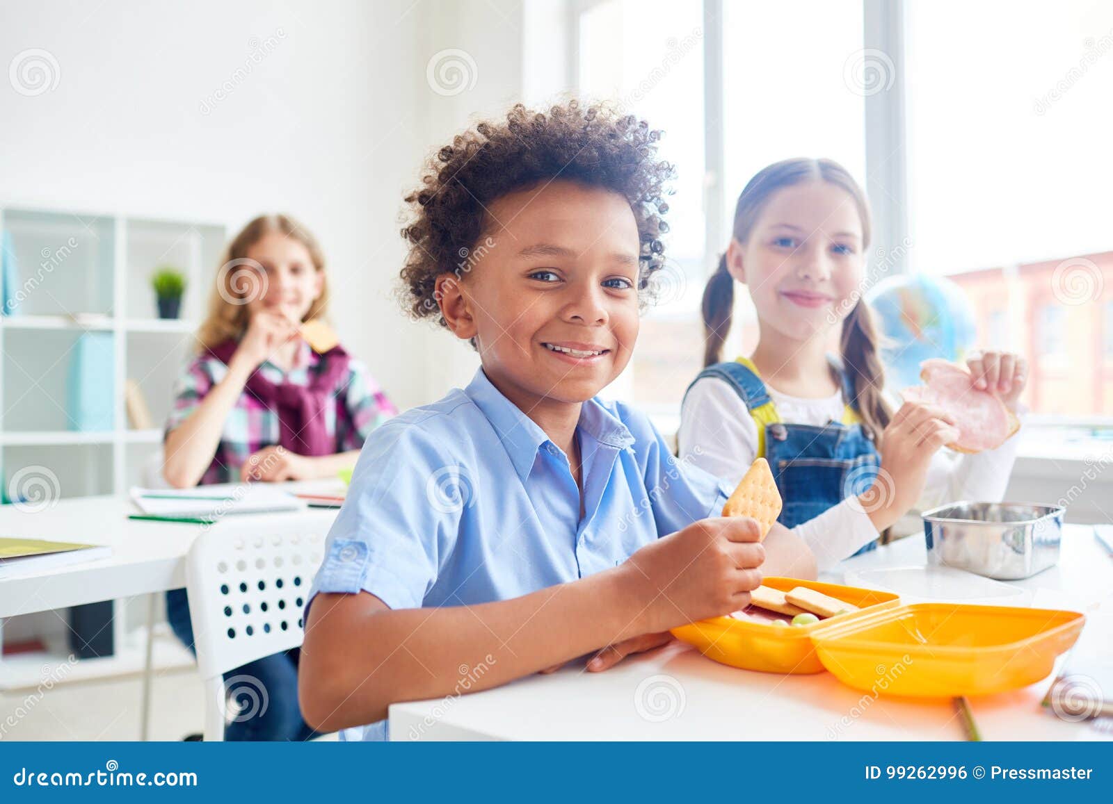 Hungry classmates stock photo. Image of learner, sandwich - 99262996