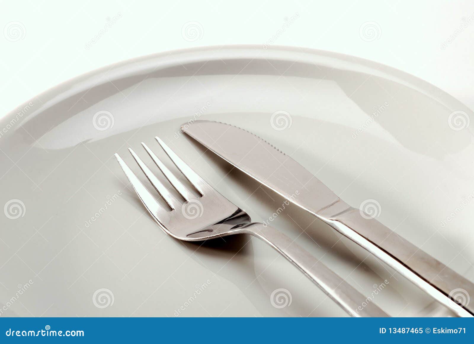 Cutlery on plates stock image. Image of washed, polished - 13487465