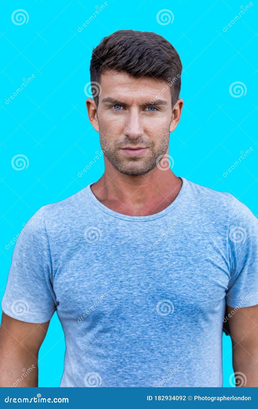 Portrait of Young Attractive Man Standing Against Wall Stock Photo ... Portrait of Young Attractive Man Standing Against Wall Stock Photo ...