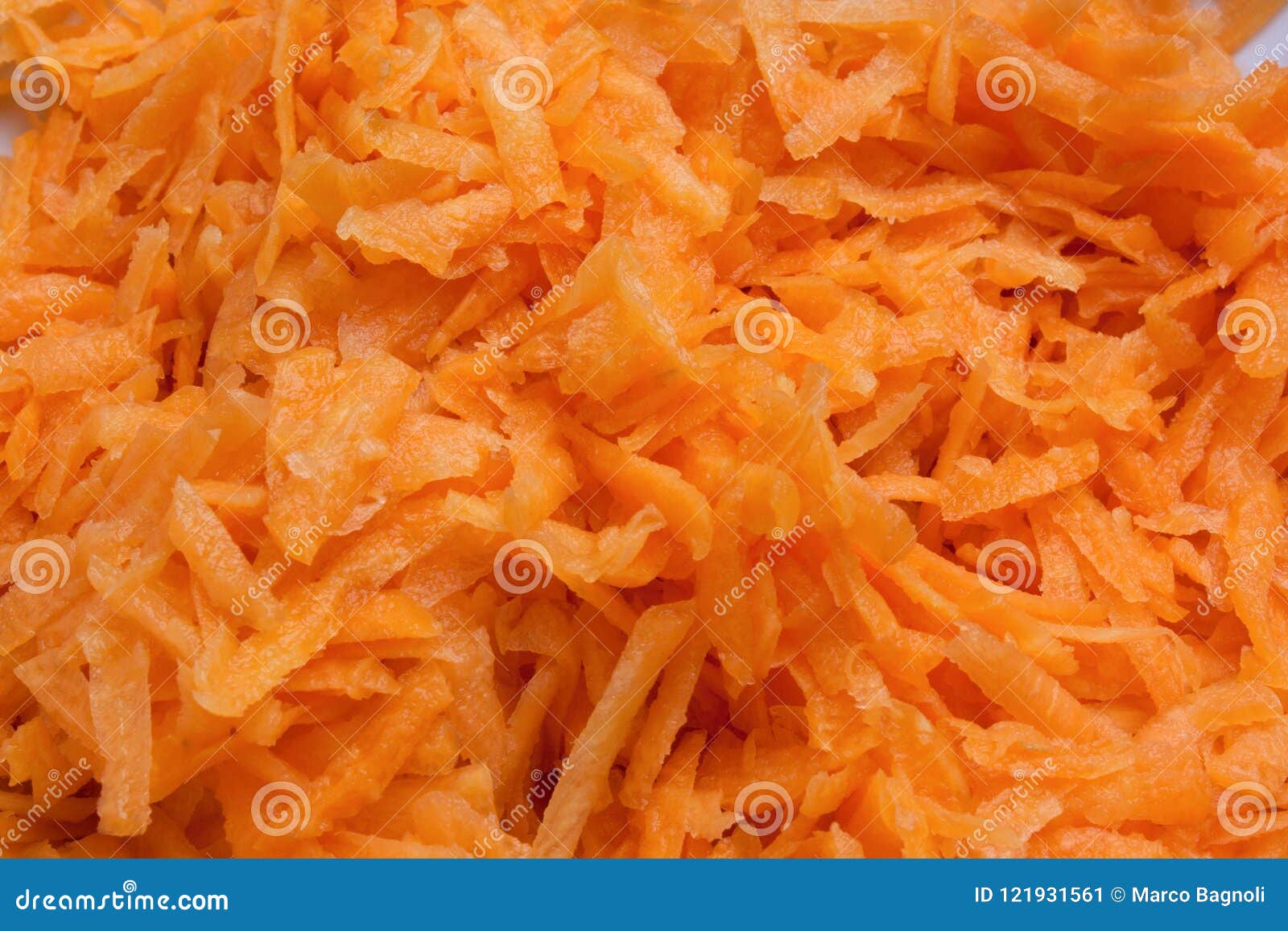 Cutted carrots in a bowl stock image. Image of orange - 121931561