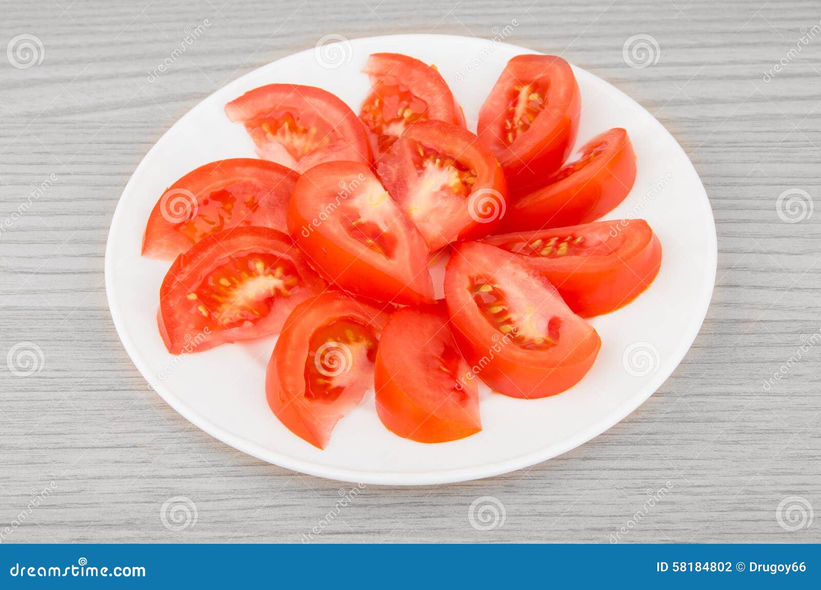 Cutted into Pieces Tomatoes in Plate on Table Stock Photo - Image of ...