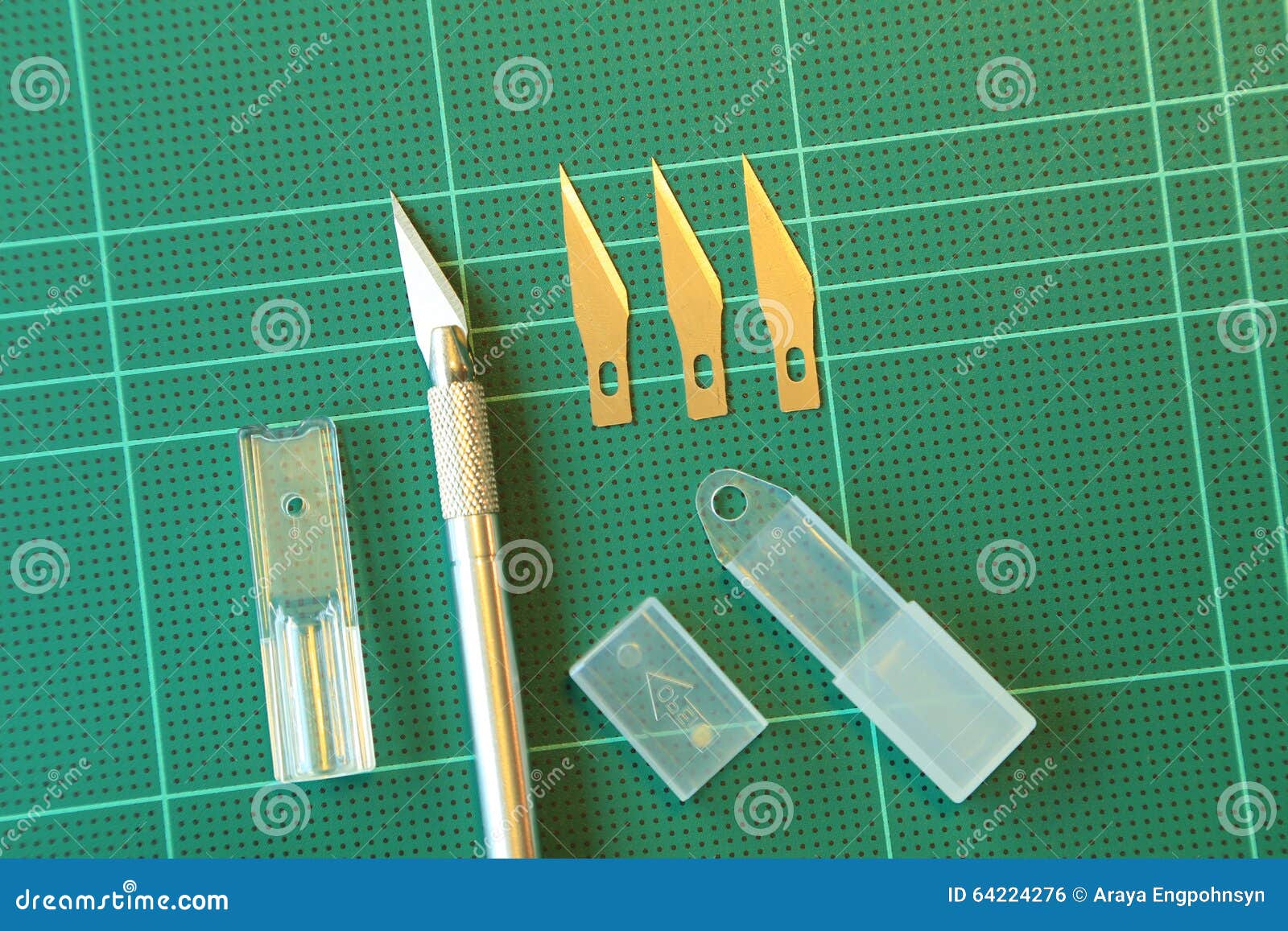 Cutter on Green Cutting Board Stock Photo - Image of cutting, cutter ...