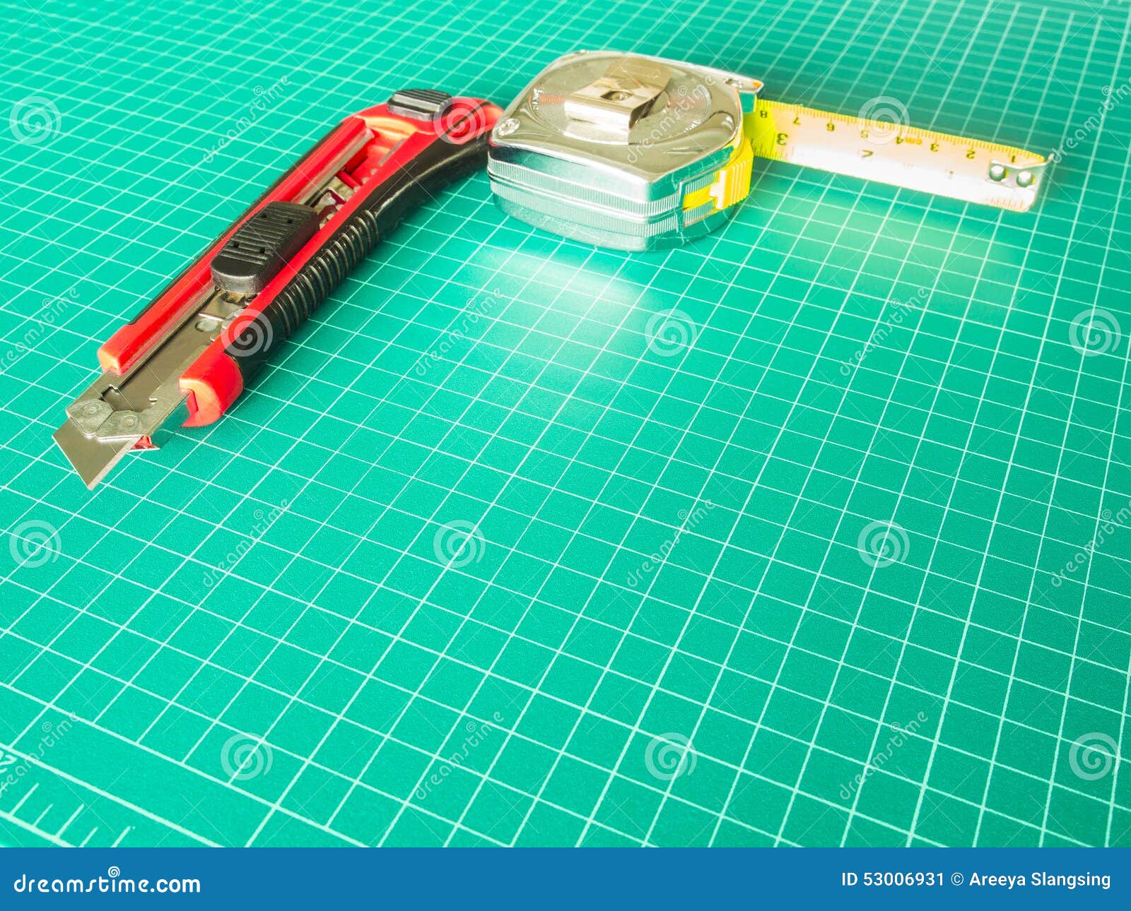 Cutter on Green Grid Cutting Pad Stock Image - Image of measurement ...