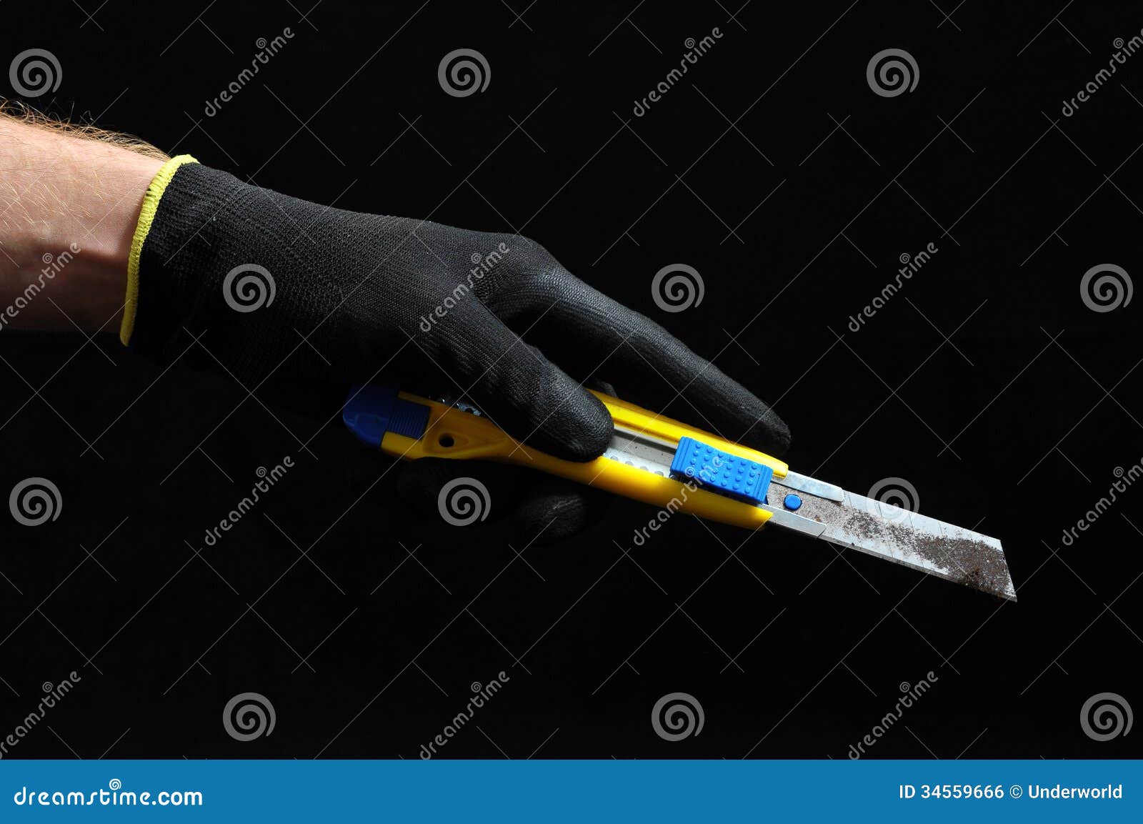 Cutter and a Hand stock photo. Image of close, grip, dark - 34559666