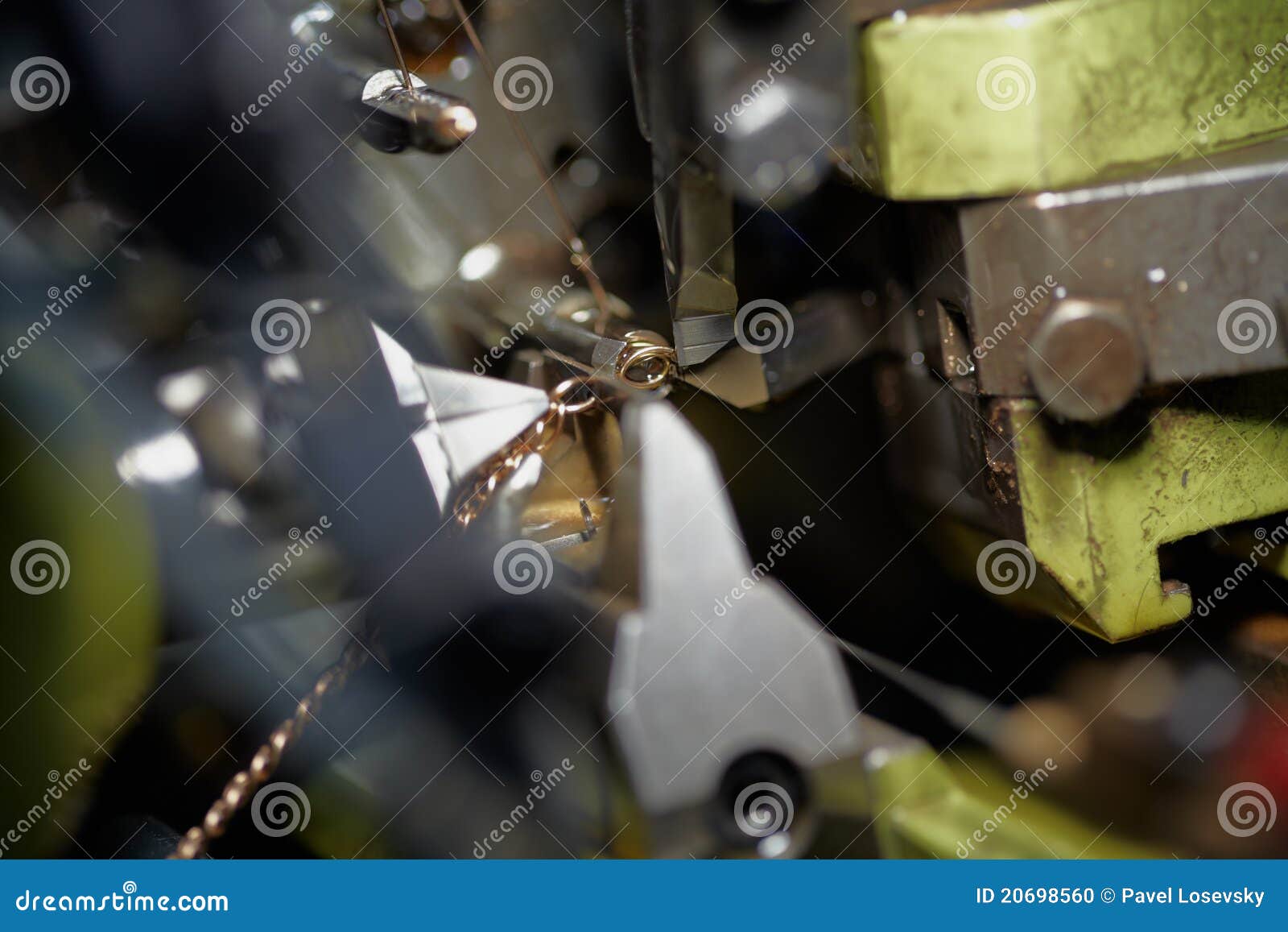 Cutter and Wire in Automatic Chain-bending Machine Stock Photo - Image ...