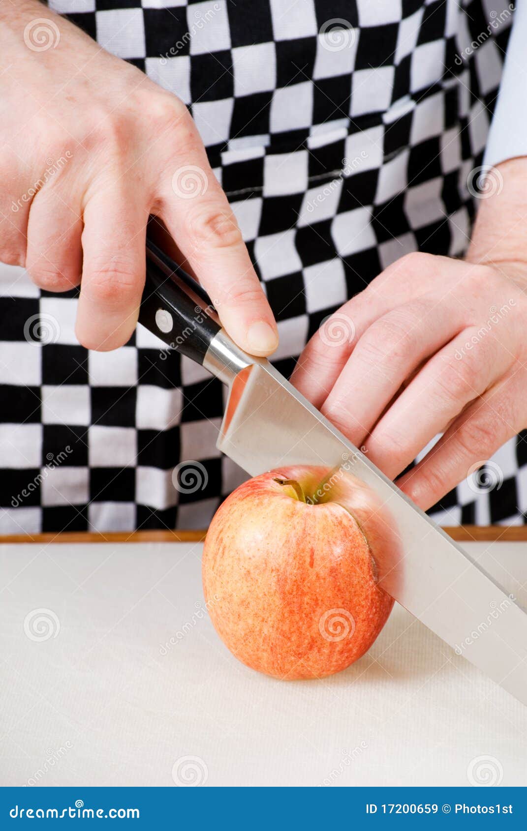 Cutting an apple stock image. Image of cook, cutting - 17200659