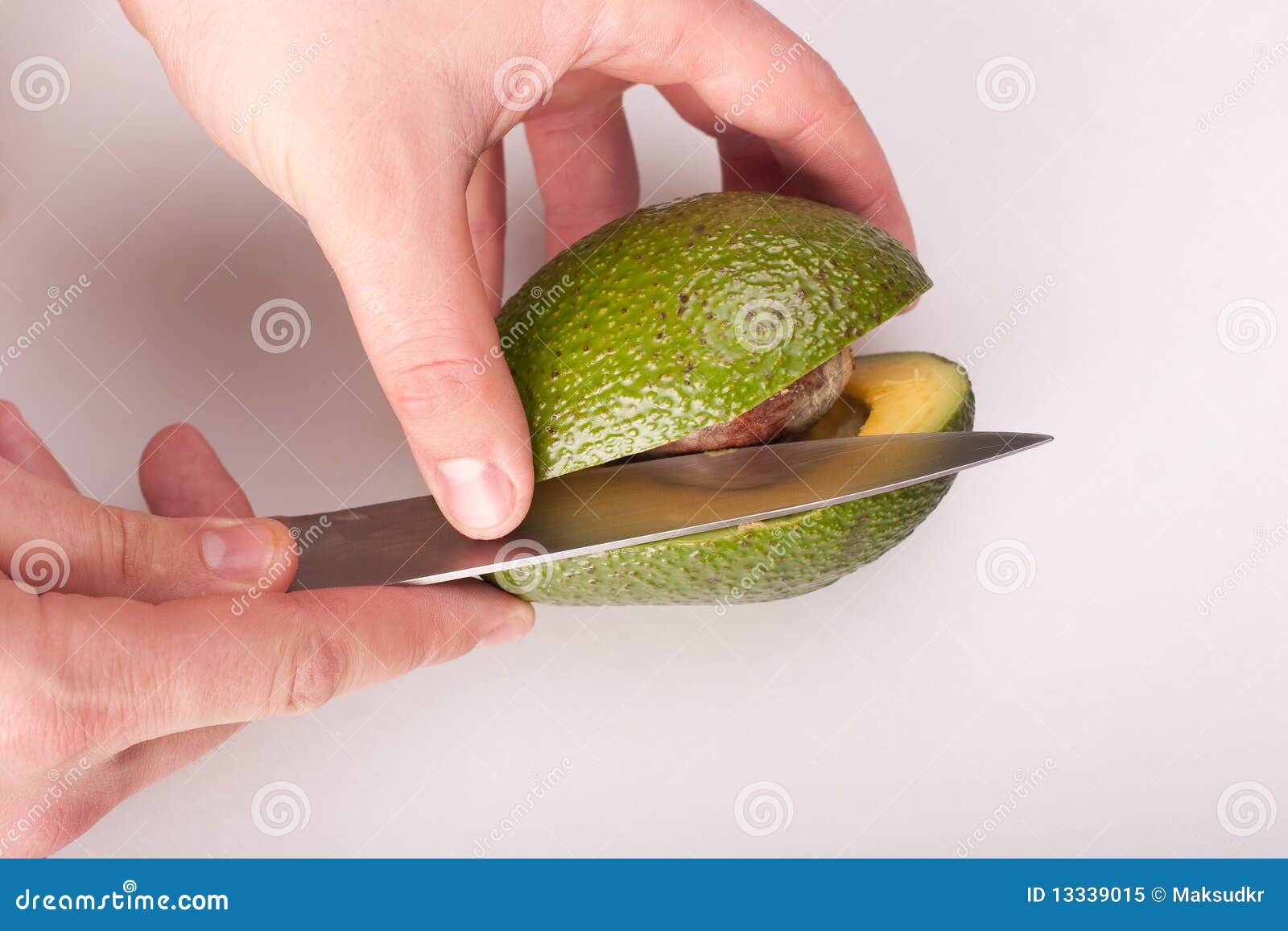 Cutting of avocado stock image. Image of cook, knife - 13339015