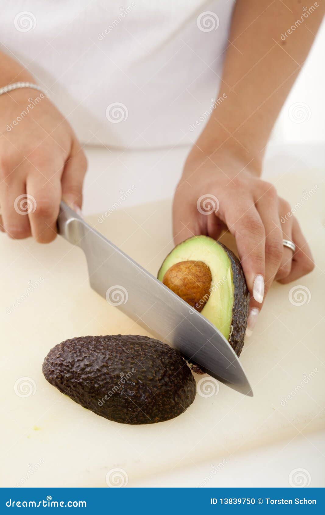 Cutting the avocado stock photo. Image of preparation - 13839750
