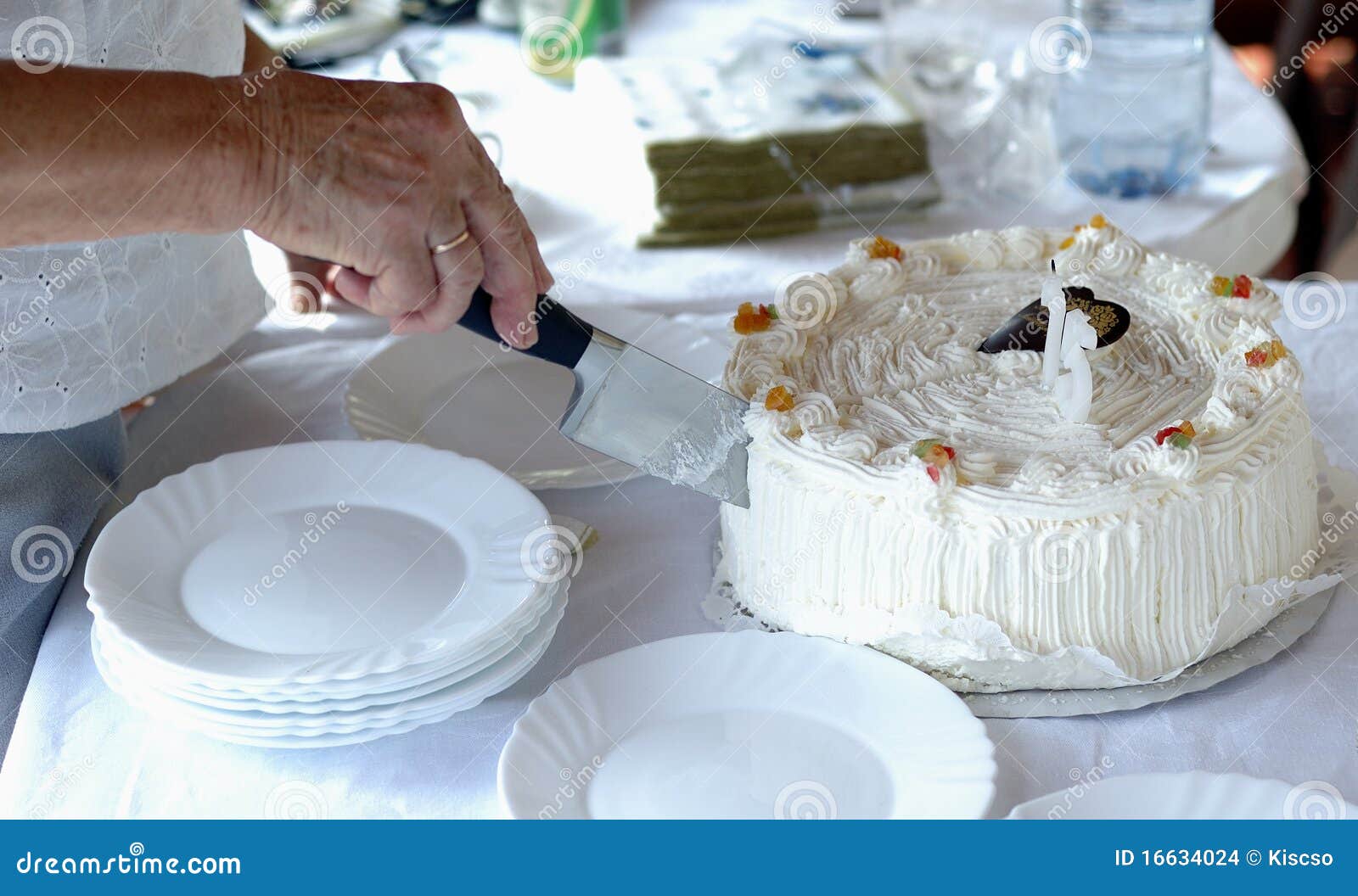 Cutting birthday cake stock photo. Image of birthday - 16634024