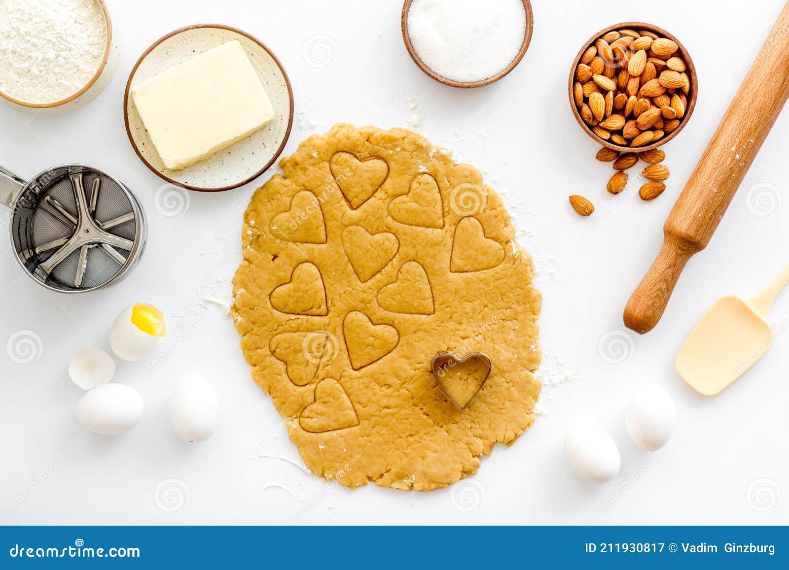 Cutting Biscuits with a Cookie Cutter on Dough, Top View Stock Image ...