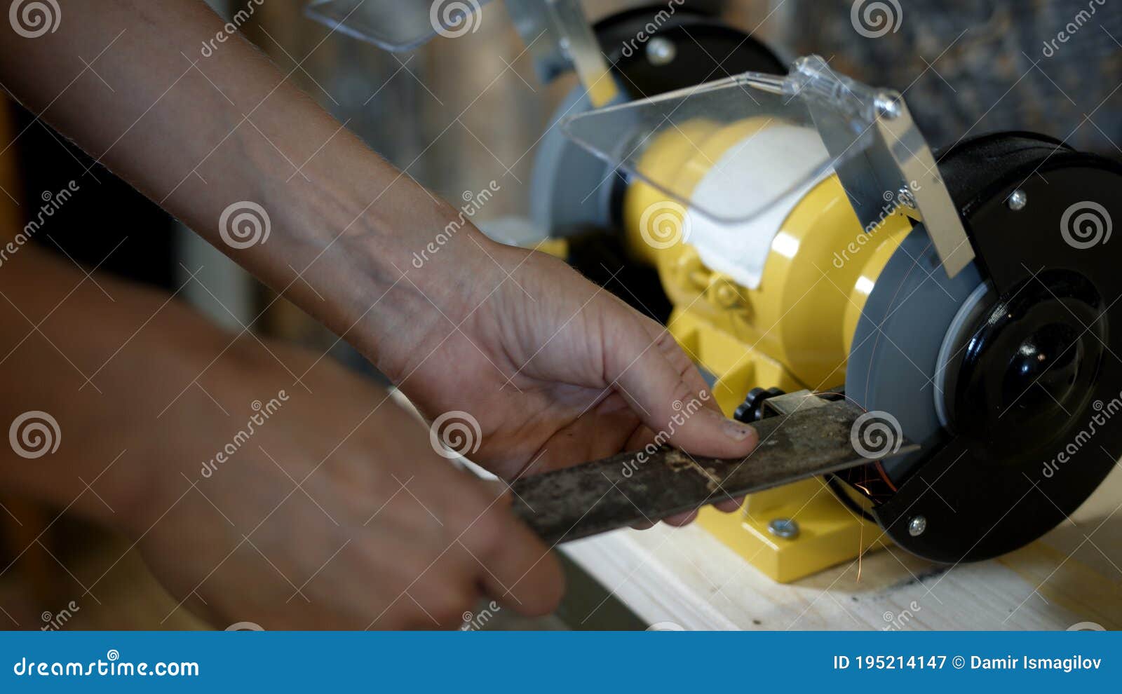 Electric Sharpener and Blade Close Up, Hands Cutting Knife Stock Image ...