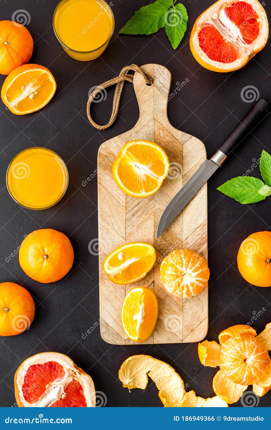 Cutting Board with Citrus Fruits Top View Stock Photo - Image of ...