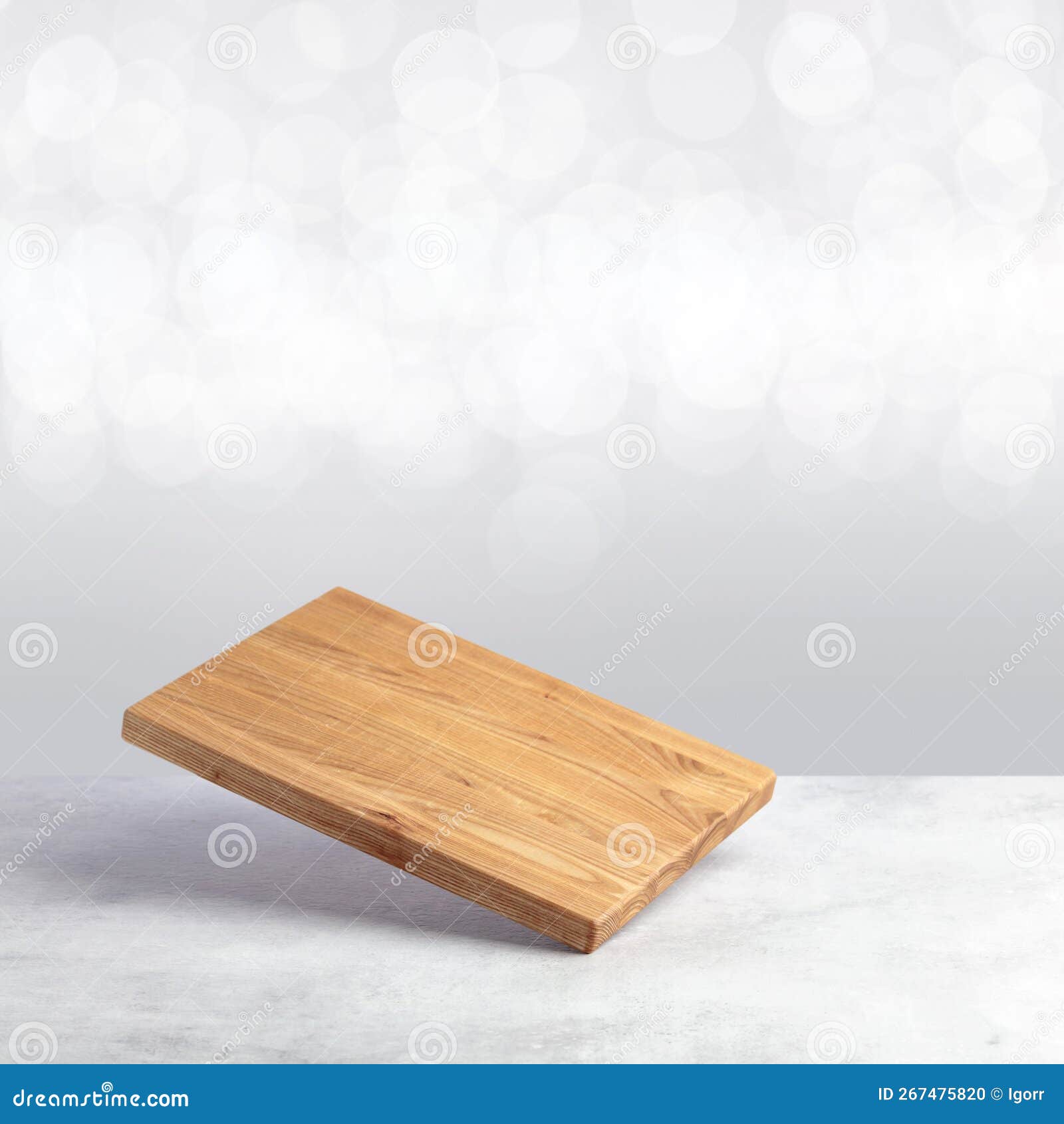 Cutting Board Falling on a Grey Stone Table Stock Photo - Image of ...