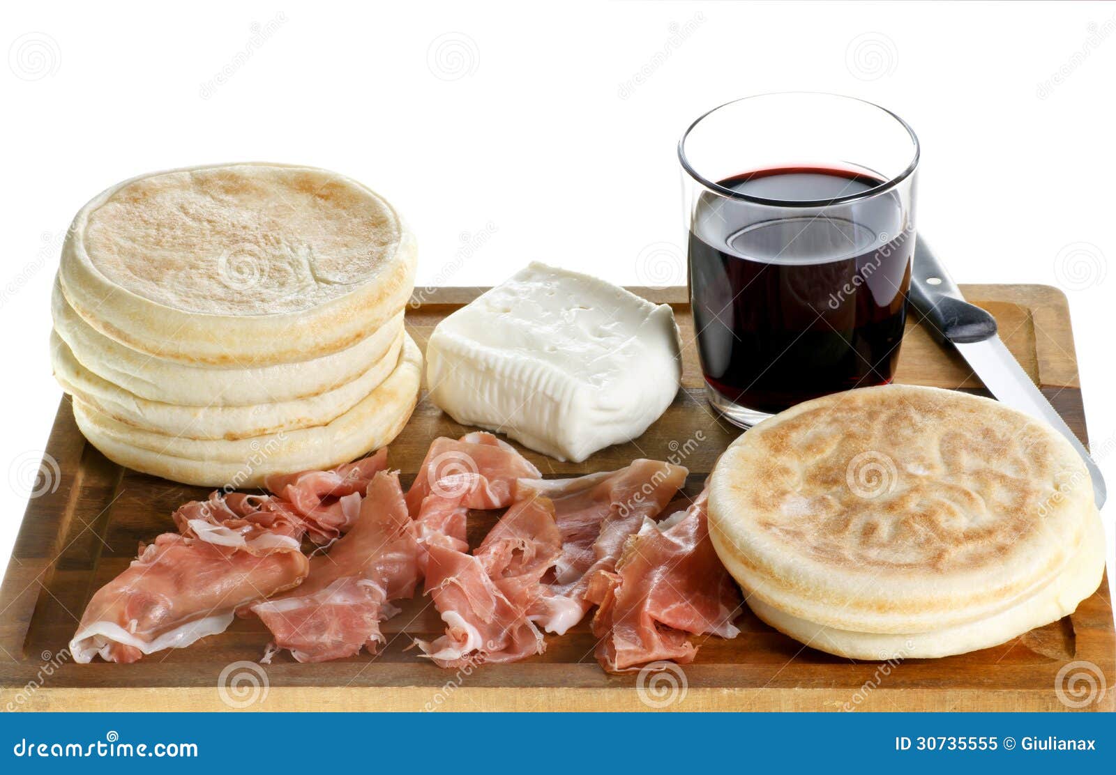 Cutting Board with Small Round Flat Bread, Ham, Cheese and Glass of Red ...