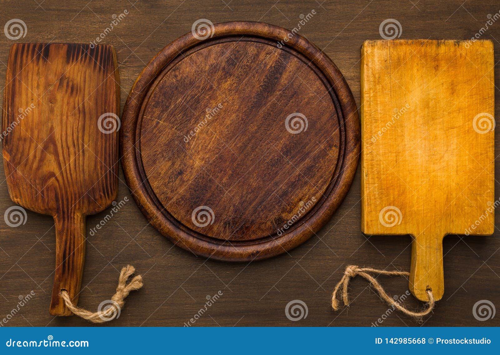 Cutting boards on table. stock photo. Image of recipe - 142985668