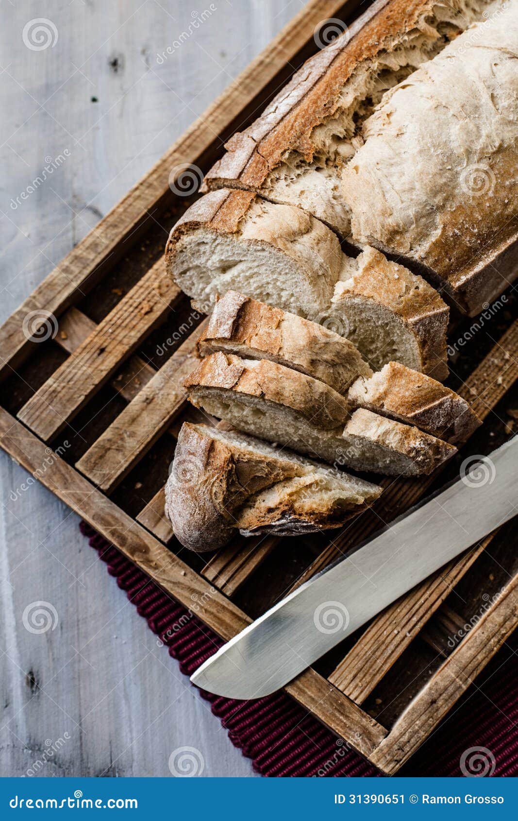 Cutting bread stock image. Image of ingredient, eating - 31390651