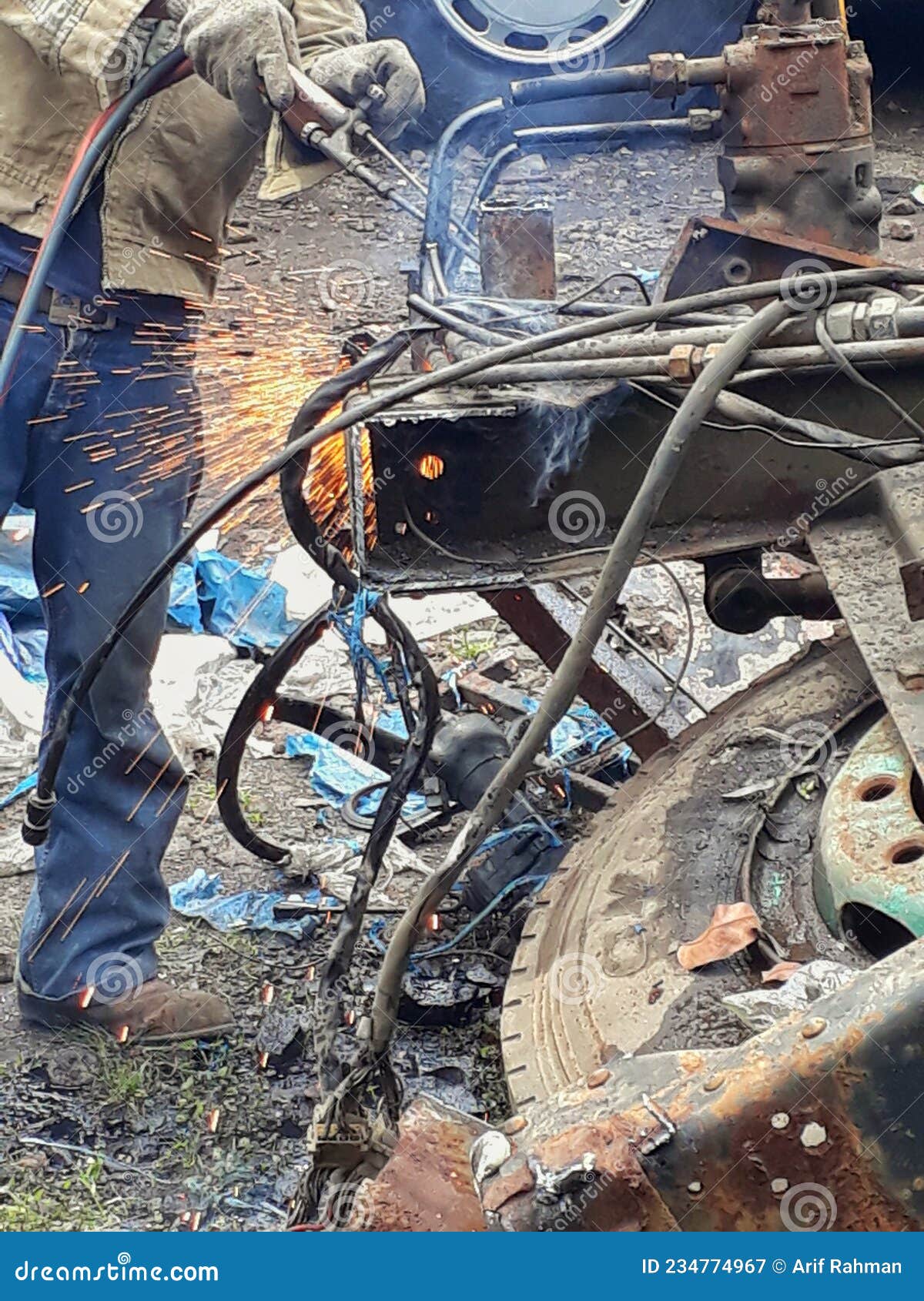 Cutting the Bus Chassis Iron with a Welding Cutting Tool that Results ...
