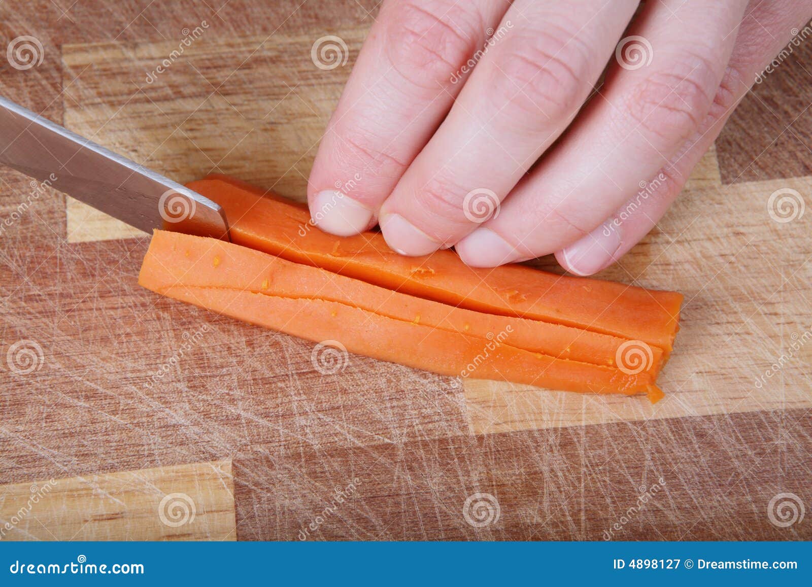 Cutting the carrot stock image. Image of knife, kitchen - 4898127