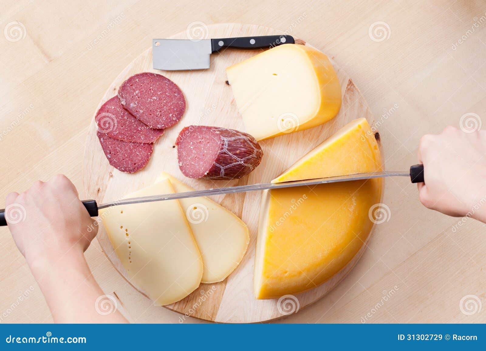 Cutting cheese and sausage stock image. Image of cutting - 31302729