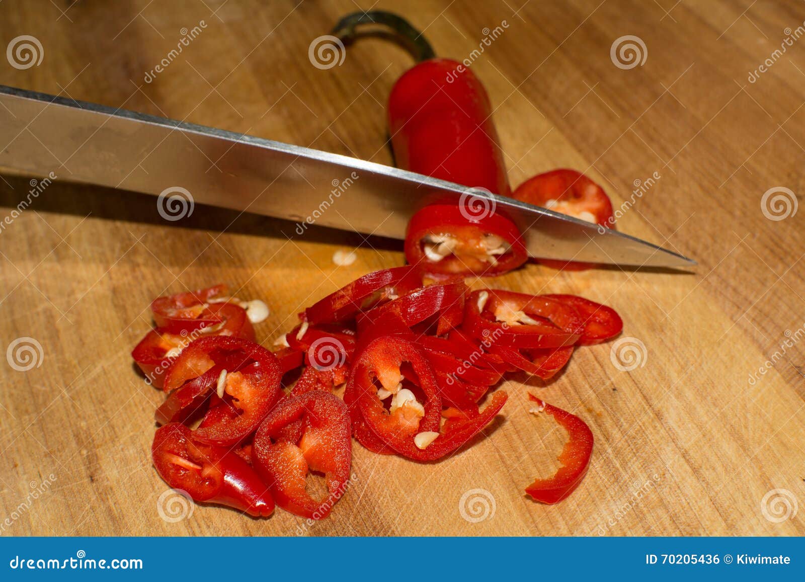 Cutting chili pepper stock photo. Image of chile, green - 70205436