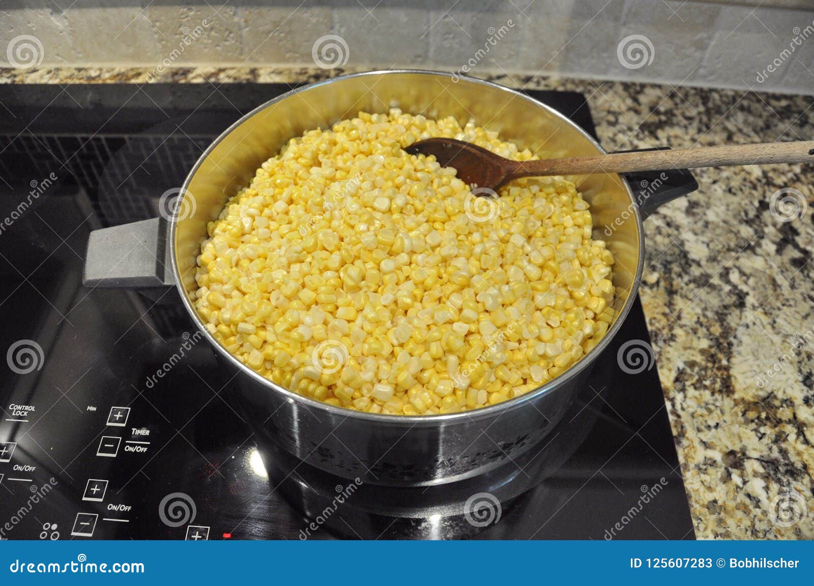 Cutting corn of the cob stock image. Image of healthy - 125607283