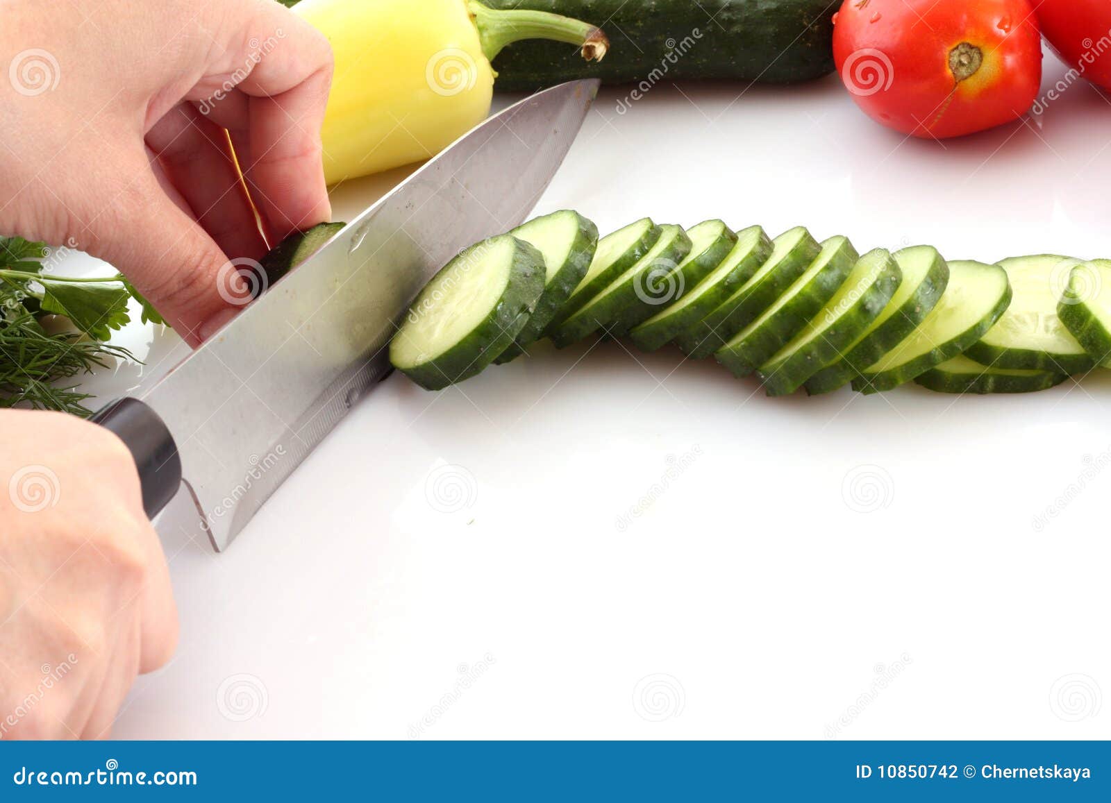 Cutting A Cucumber Stock Photography - Image: 10850742