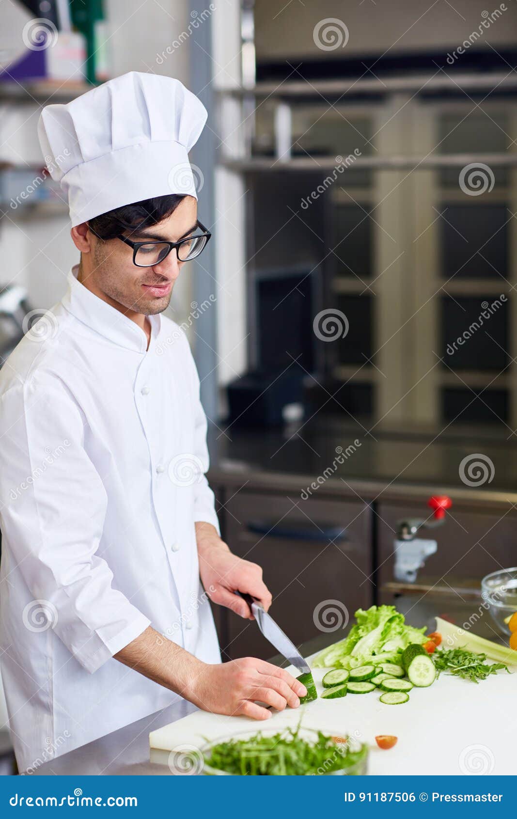Cutting cucumbers stock photo. Image of culinary, cooking - 91187506