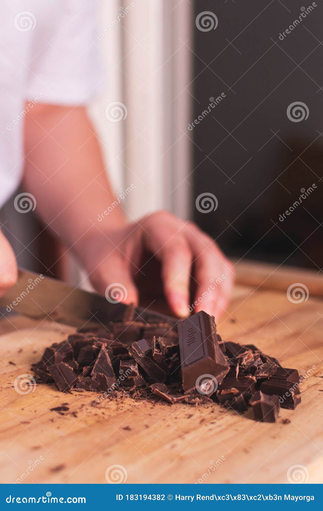 Cutting chocolate stock photo. Image of bakery, cook - 183194382