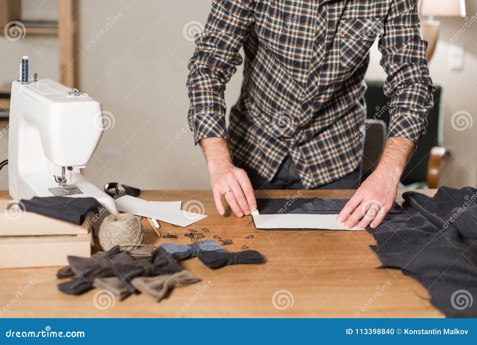 Cutting Dark Wool Fabric. the Line Pattern. Young Man Working As a ...