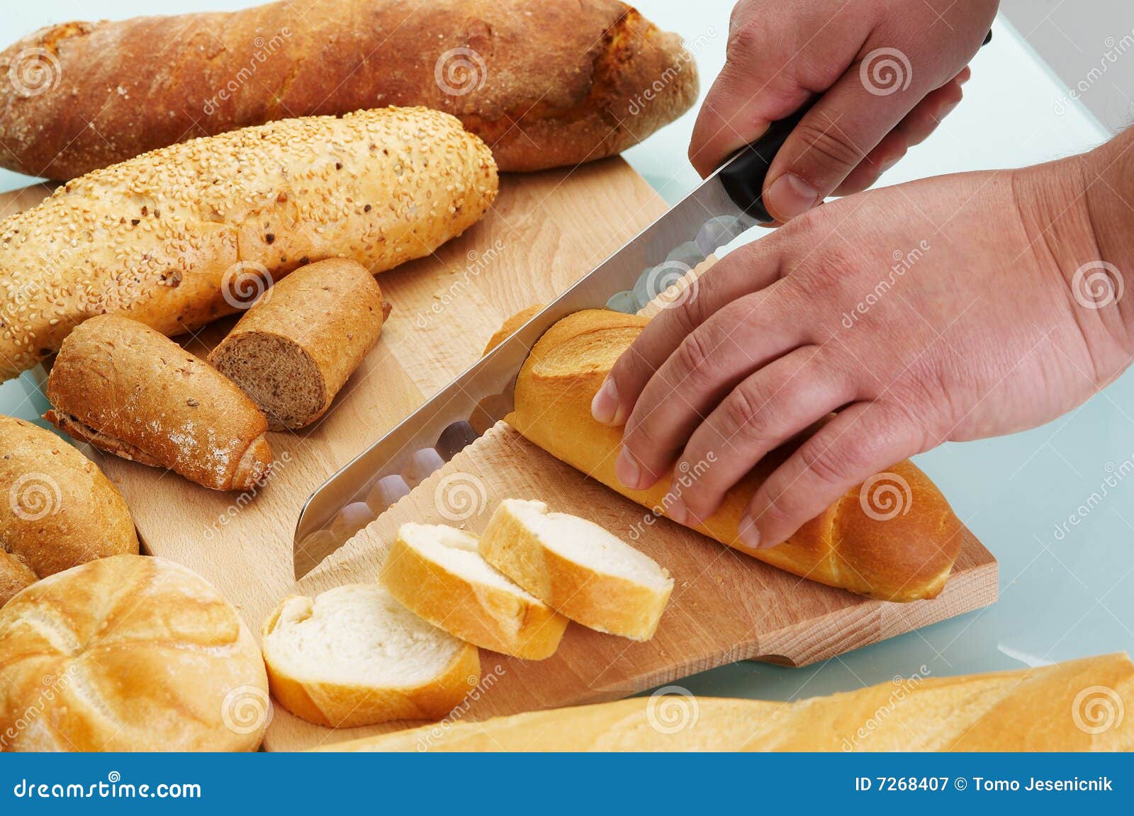 Cutting Different Sort of Bread Stock Image - Image of knife, tasty ...