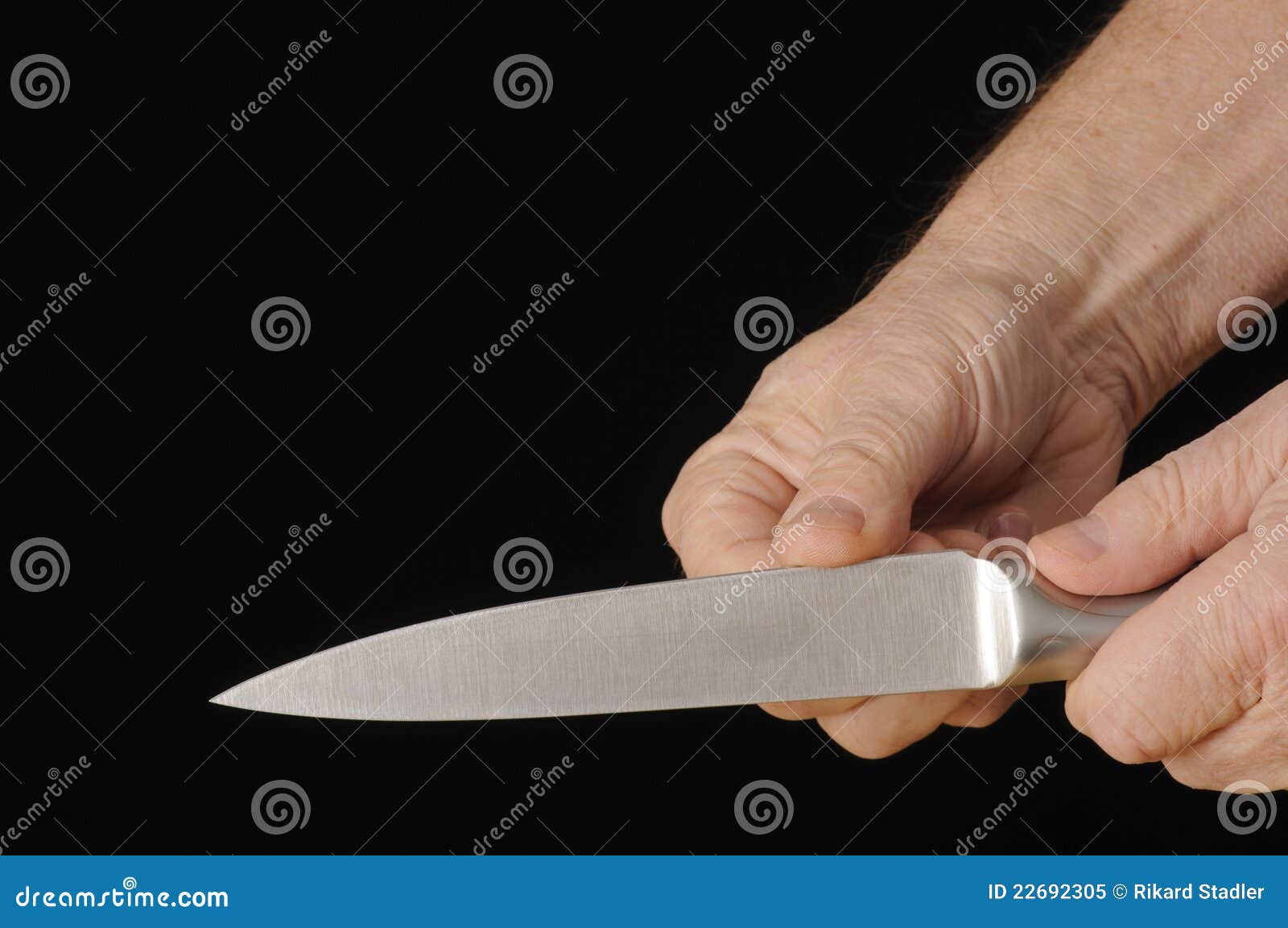 The cutting edge stock image. Image of utensil, hand - 22692305