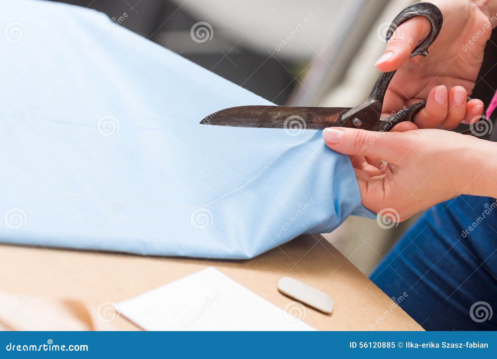 Cutting Fabric Closeup. Dressmaker At Work. Fabric Cutting Scissors ...