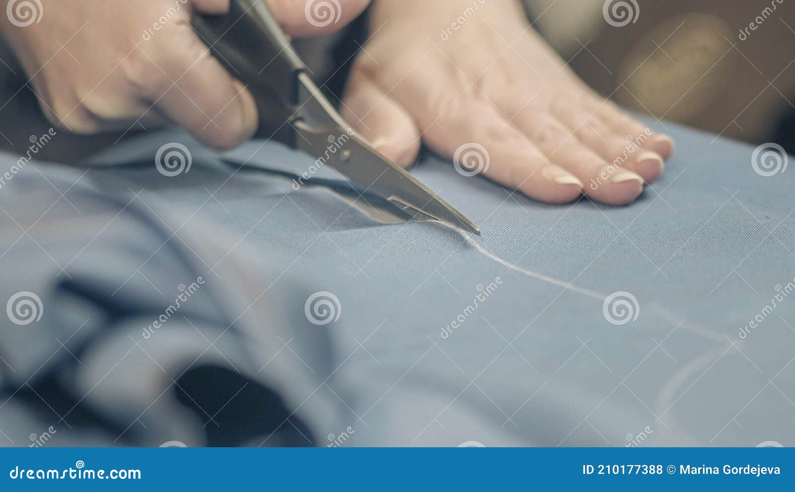 Cutting the Fabric with Sharp Scissors. Cut the Fabric with Tailor`s ...