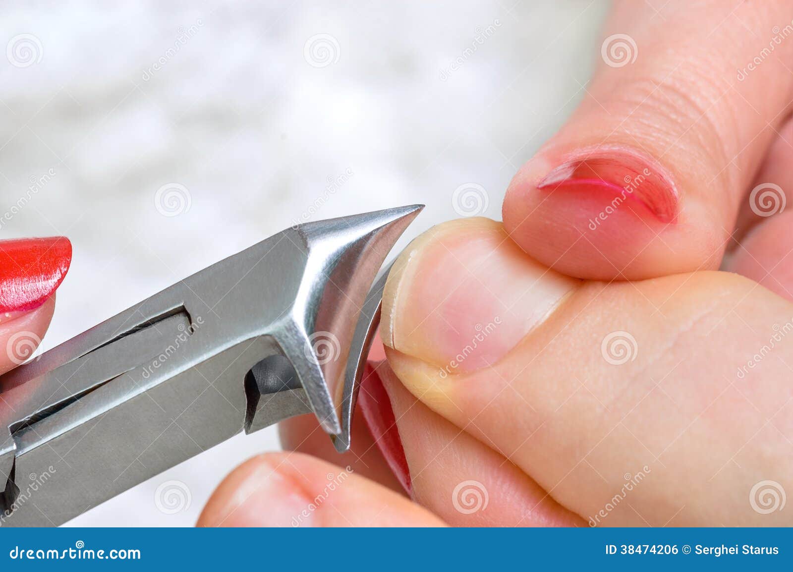 Cutting Fingernail with Clipper Stock Photo - Image of hand, close ...