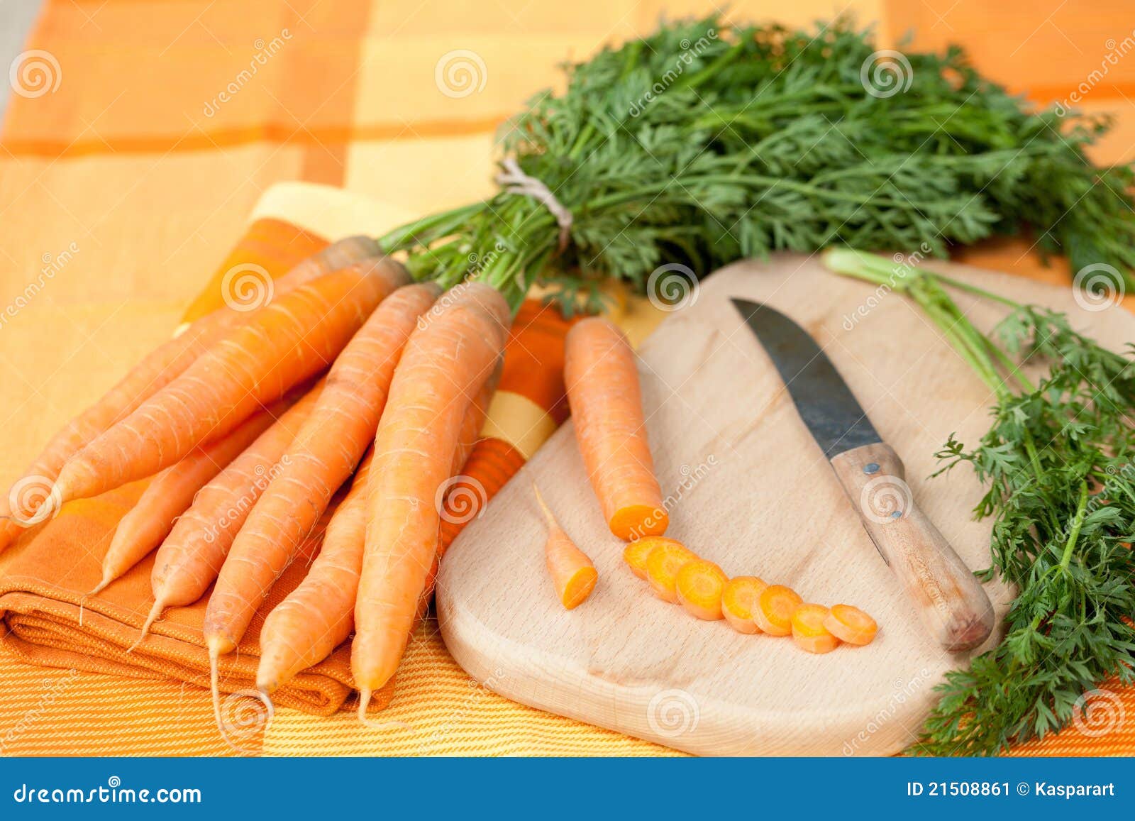 Cutting fresh carrots stock image. Image of tablecloth - 21508861