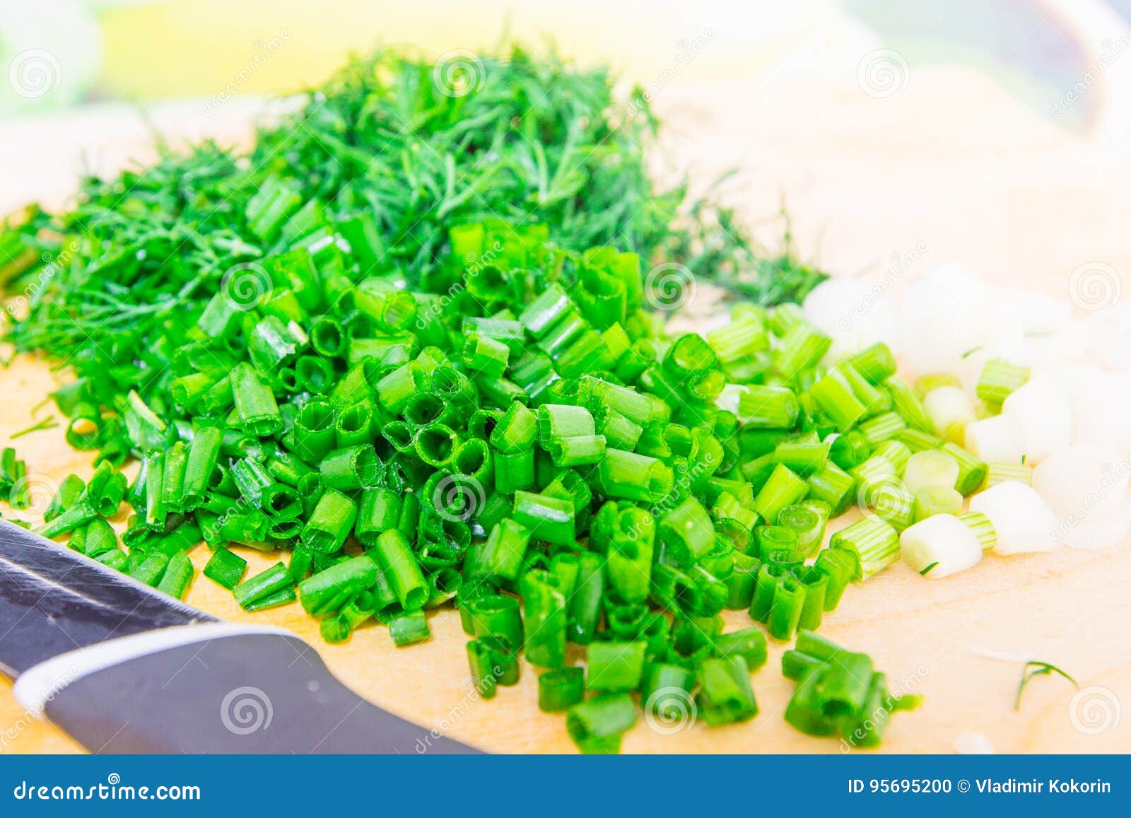 Cutting Fresh Onions and Dill for the Preparation of Vitamin Salad ...