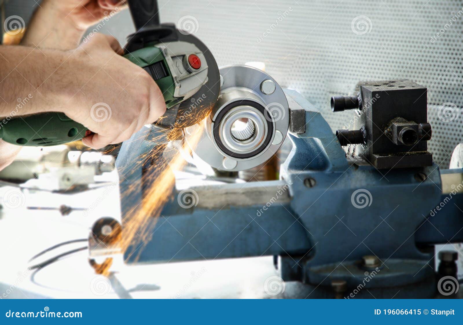 Cutting the Hub with a Circular Electric Saw on the Vice Stock Image ...