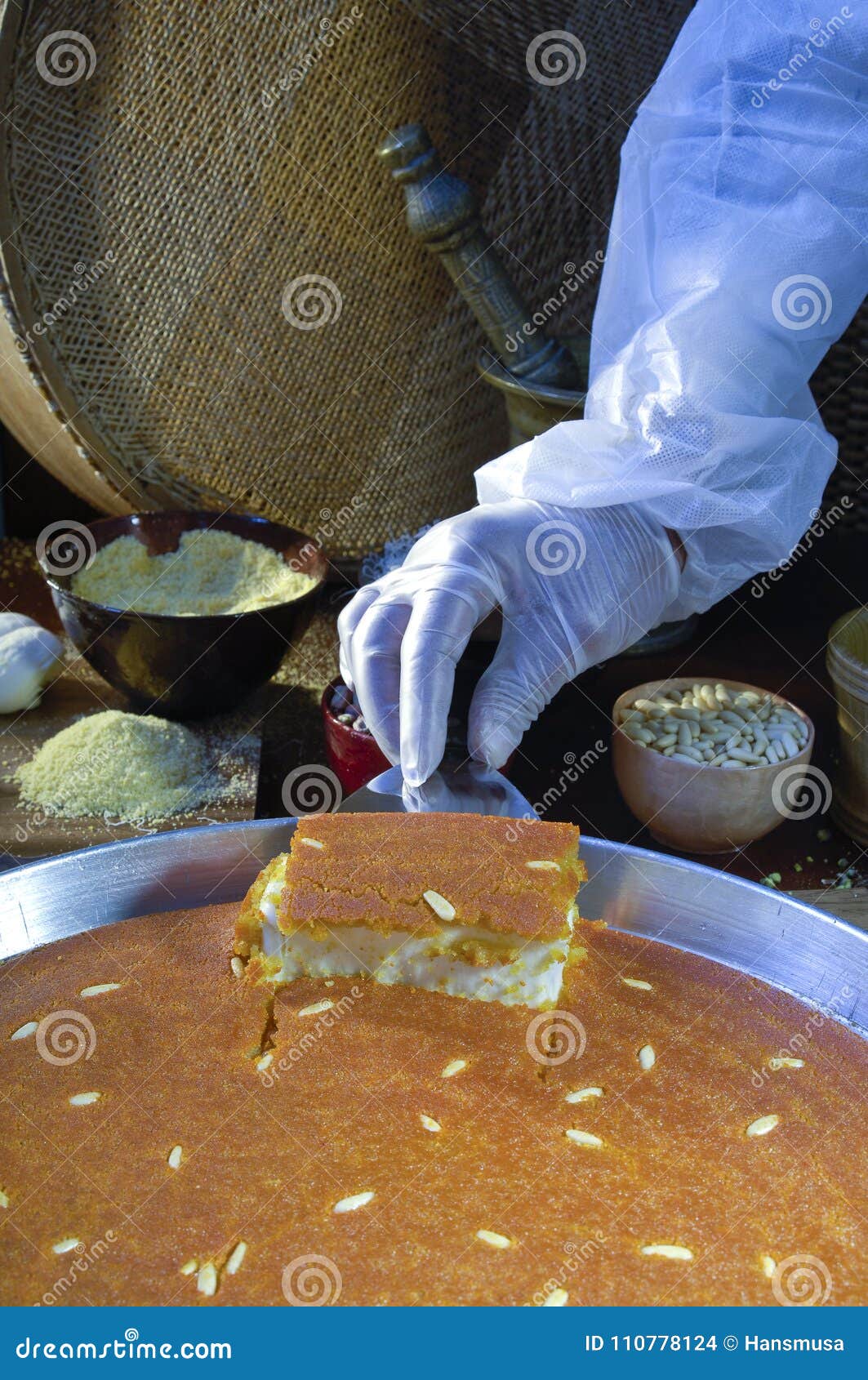 Cutting Kunafa or Kinafa, Arabic Sweets with Cheese for Ramadan a Stock ...